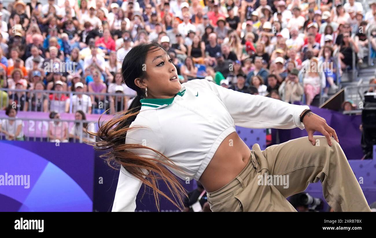 United States Logan Edra, known as B-Girl Logistx, left, competes ...