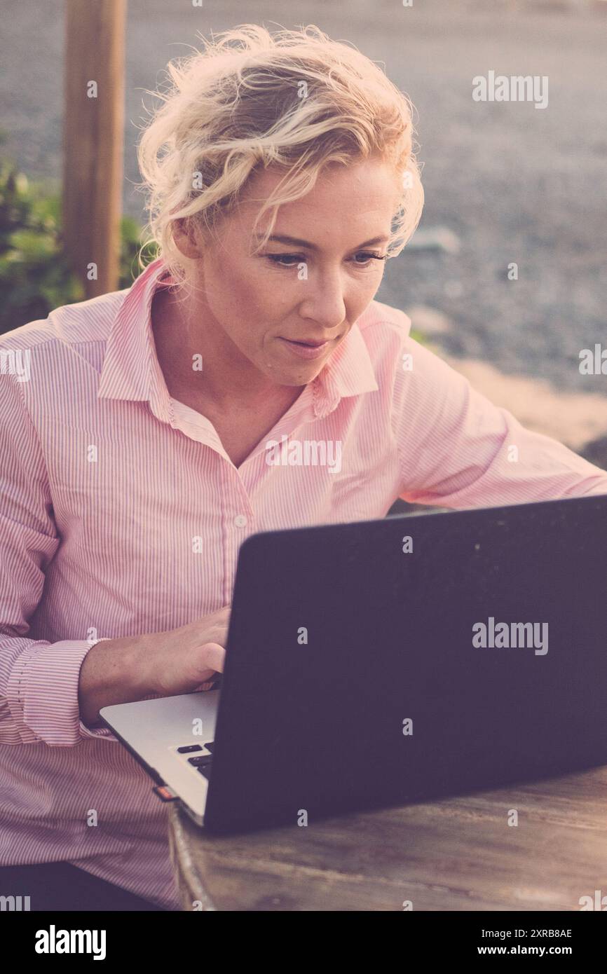 Independent travel and modern woman work outdoor with roaming internet ...