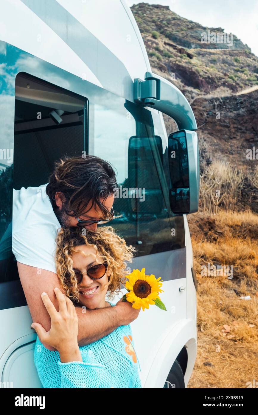 Happy traveler couple enjoy summer destination with camper van. Van ...