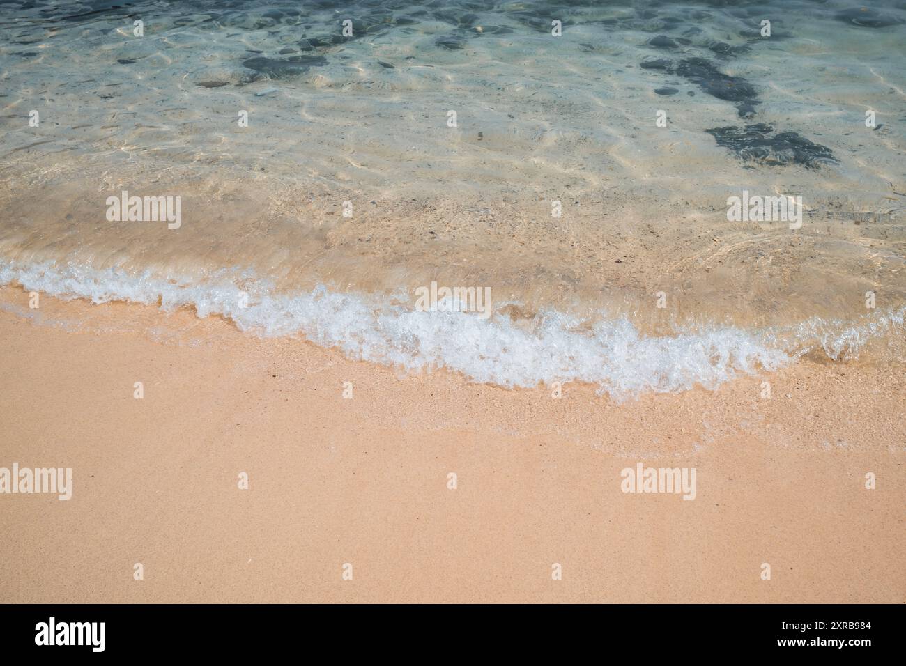 Clear wave splashing on the beach in tropical sea during summer Stock ...