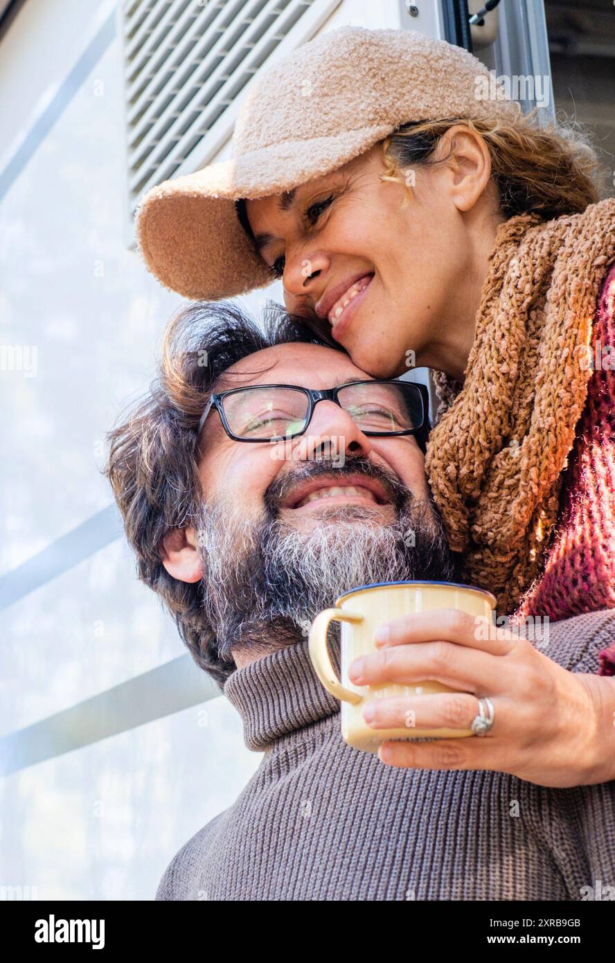 Romantic feeling moment with man and woman in tenderness outside a ...