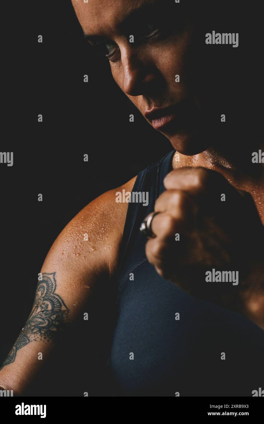 Middle age mature lady looking bad in boxe defence posture pose ...