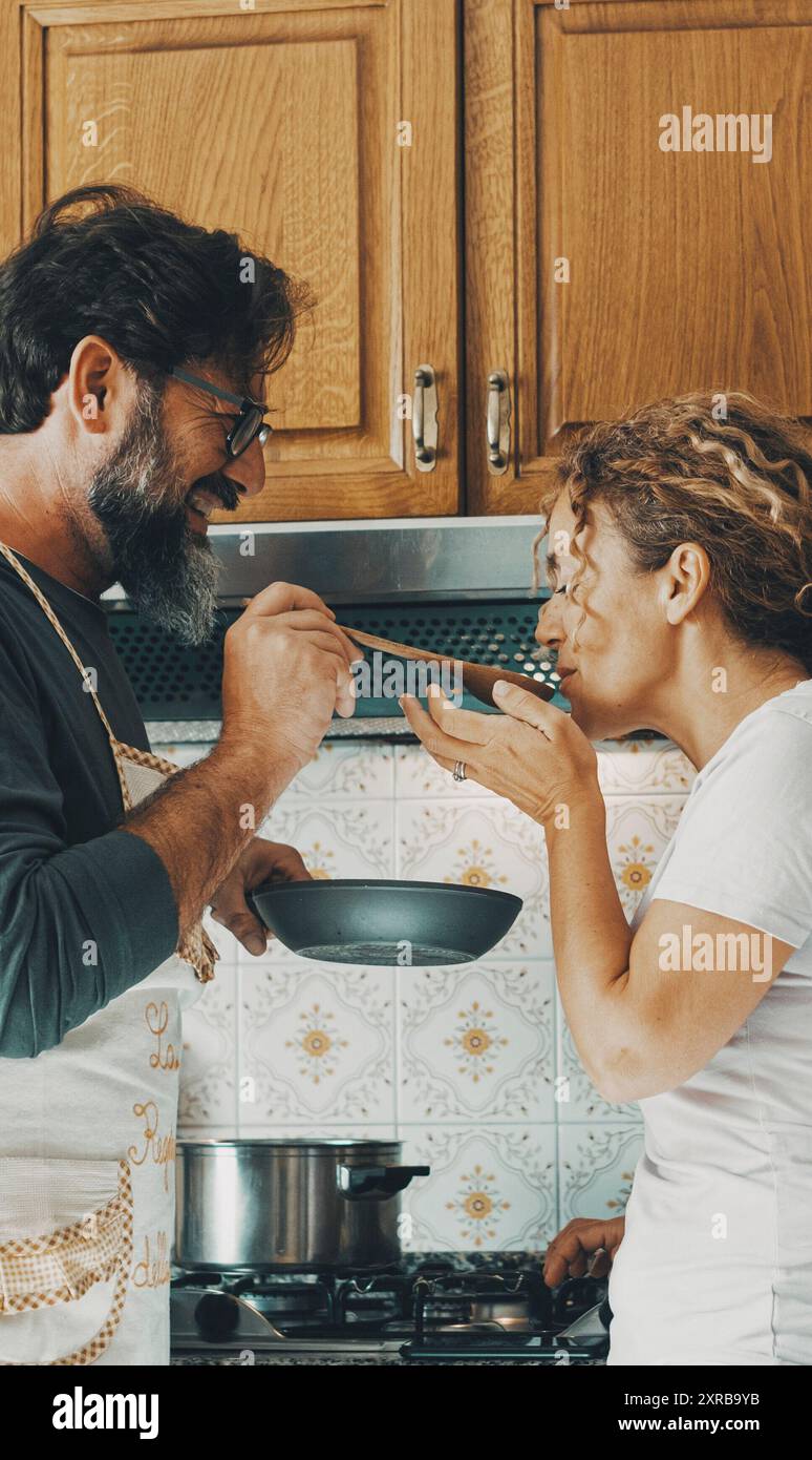 One happy real couple at home enjoying life together and relationship ...