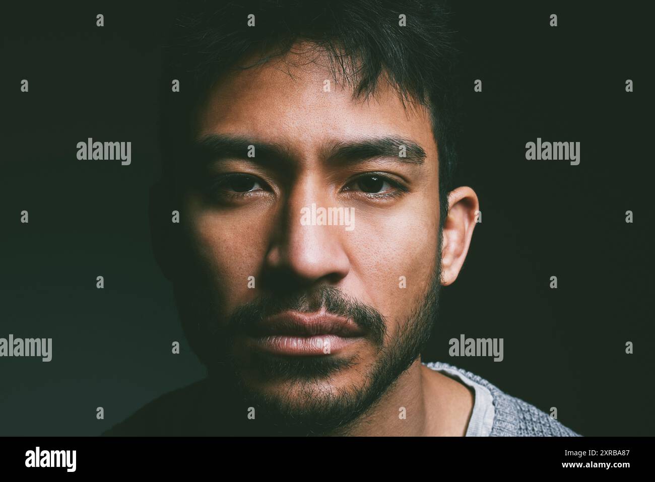Trauma, portrait and Asian man in studio with depression, crisis or ...