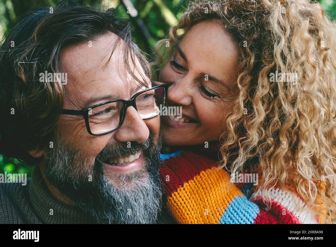 Two person happy joyful couple man and woman hug and smile together ...