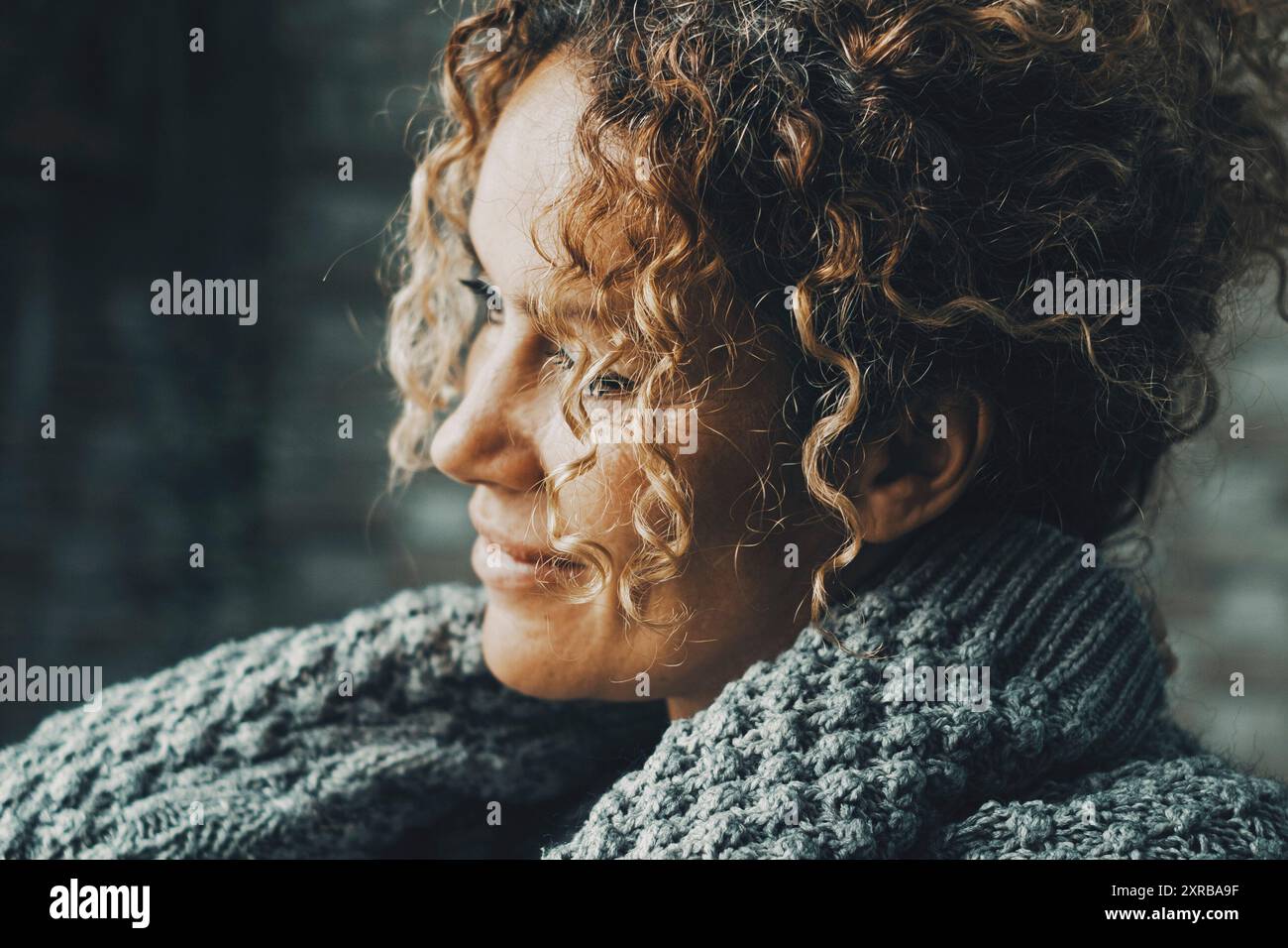 One beauty adult woman at home alone indoor hugging herself and ...