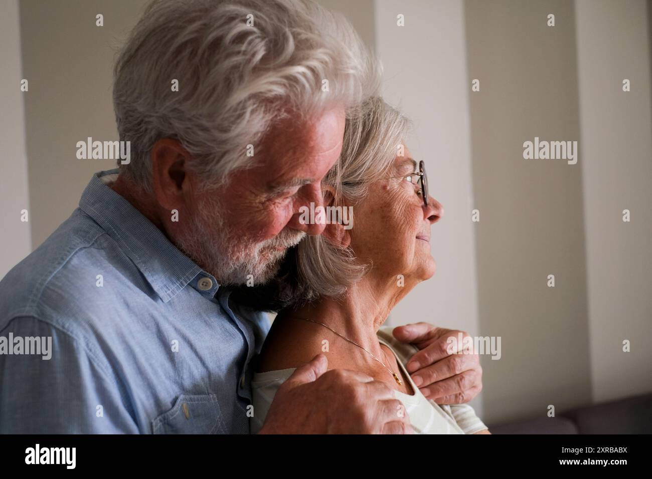 One senior man hug senior lady from behind to love and protect. Elderly ...