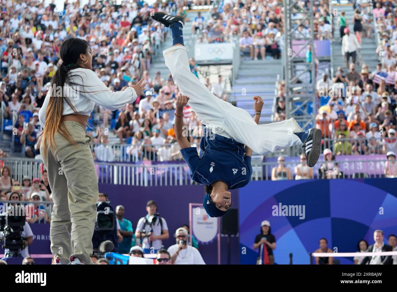 United States Logan Edra, known as B-Girl Logistx, left, and France's ...