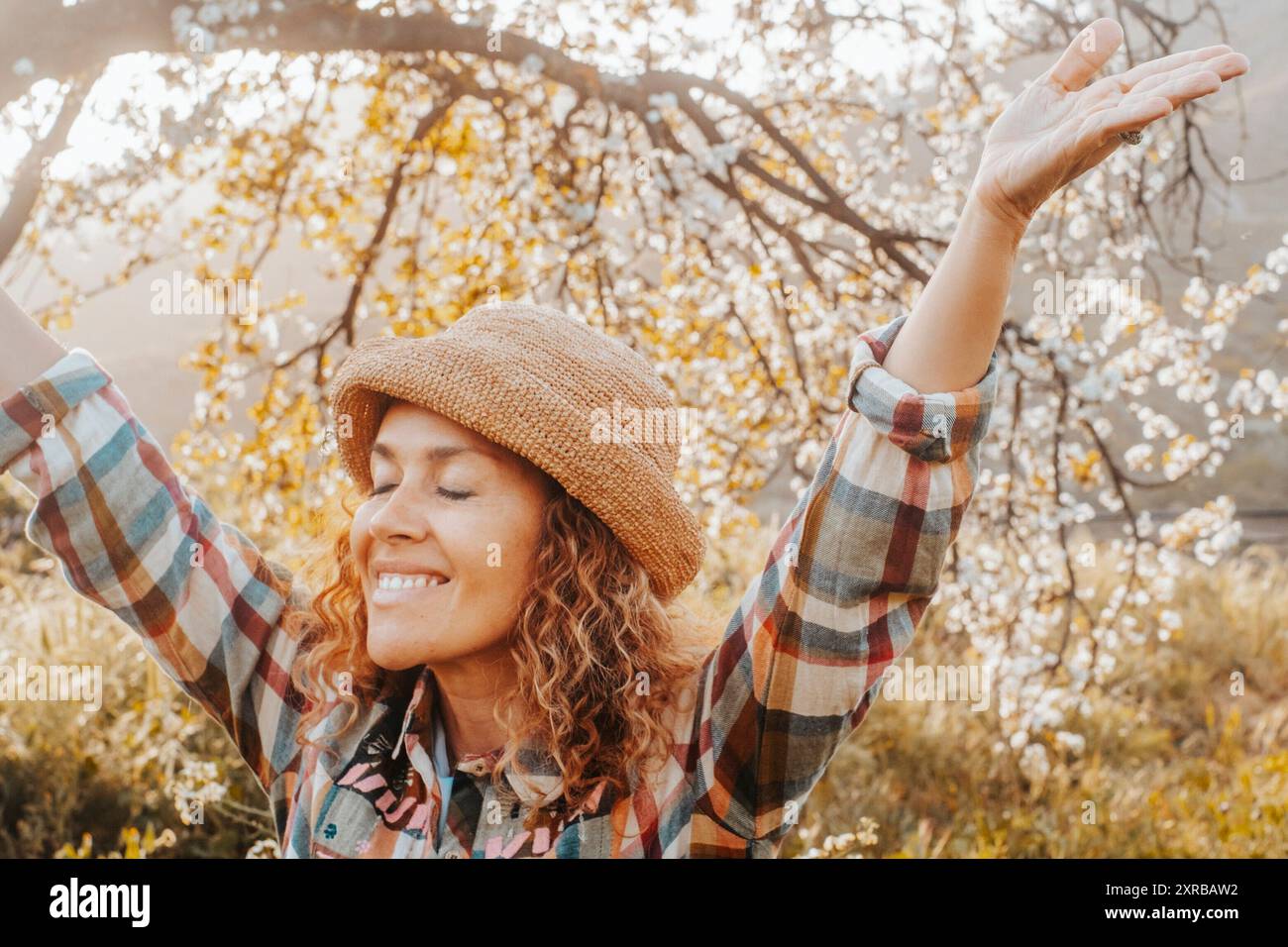 Springtime. Welcome spring concept image with overjoyed happy woman ...