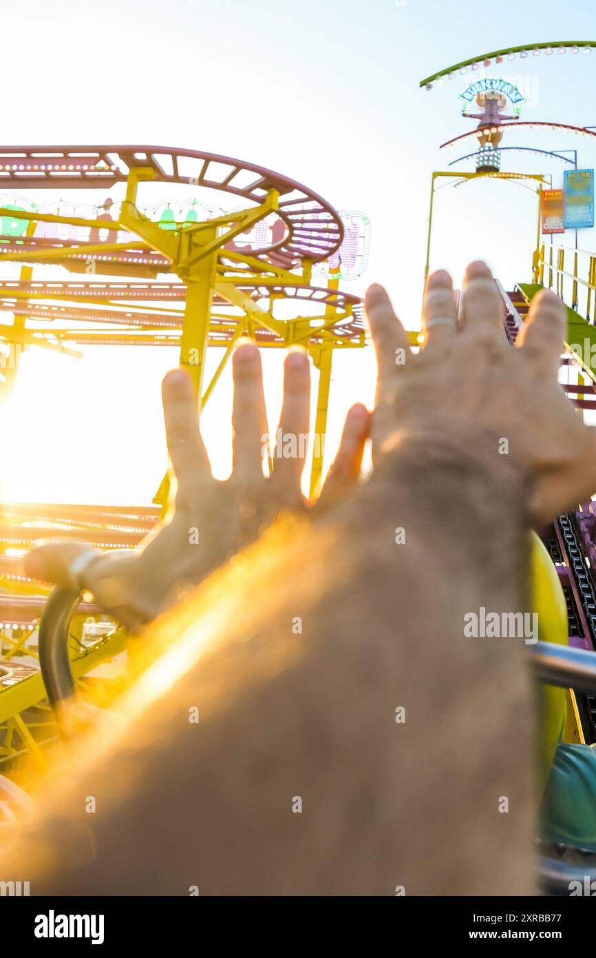 Woman cheering raised fingers in hi-res stock photography and images ...