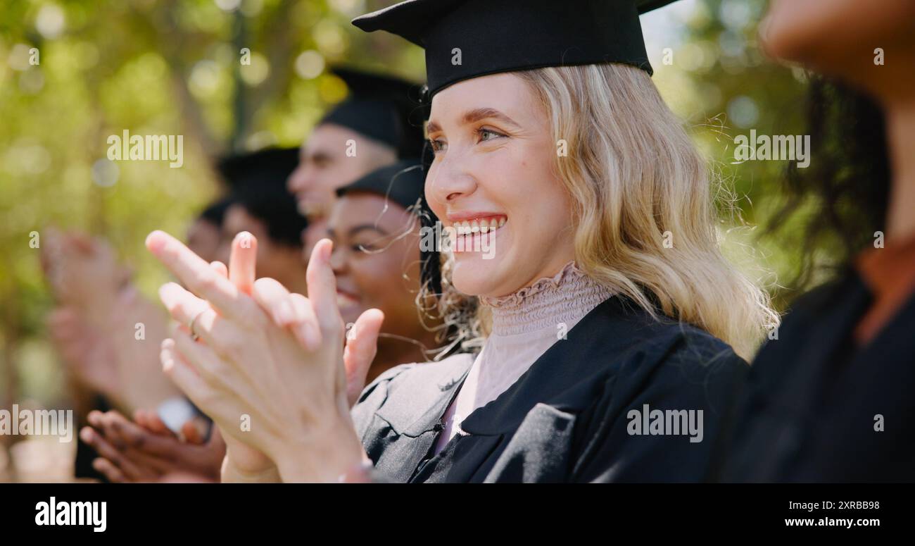 Education, woman and students clapping hands at graduation for academic ...