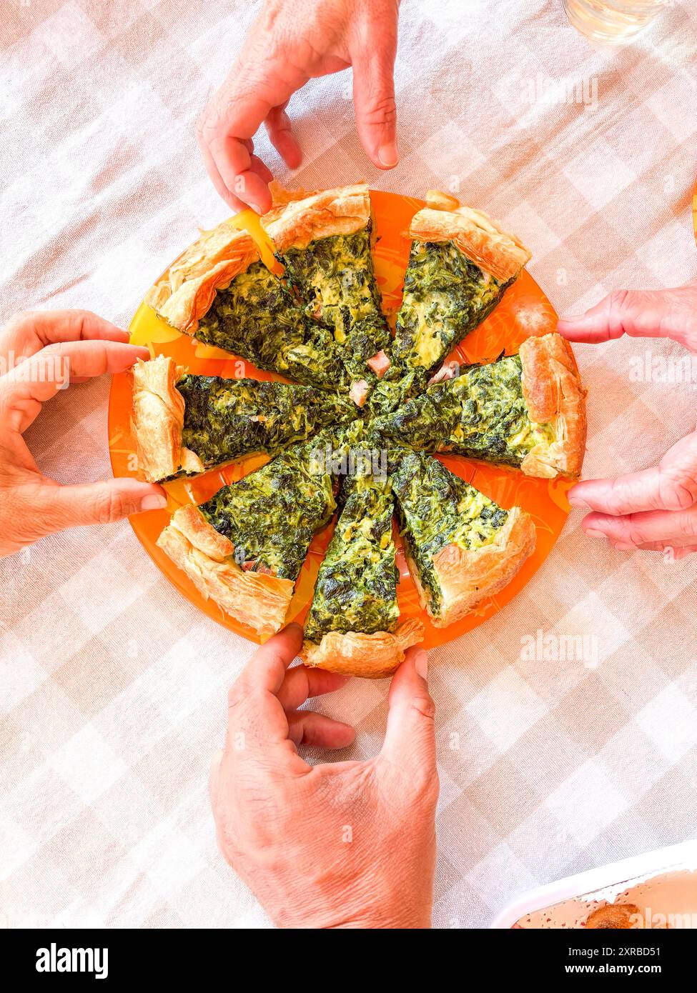 Group of people taking healthy food from dish in friendship lunch ...