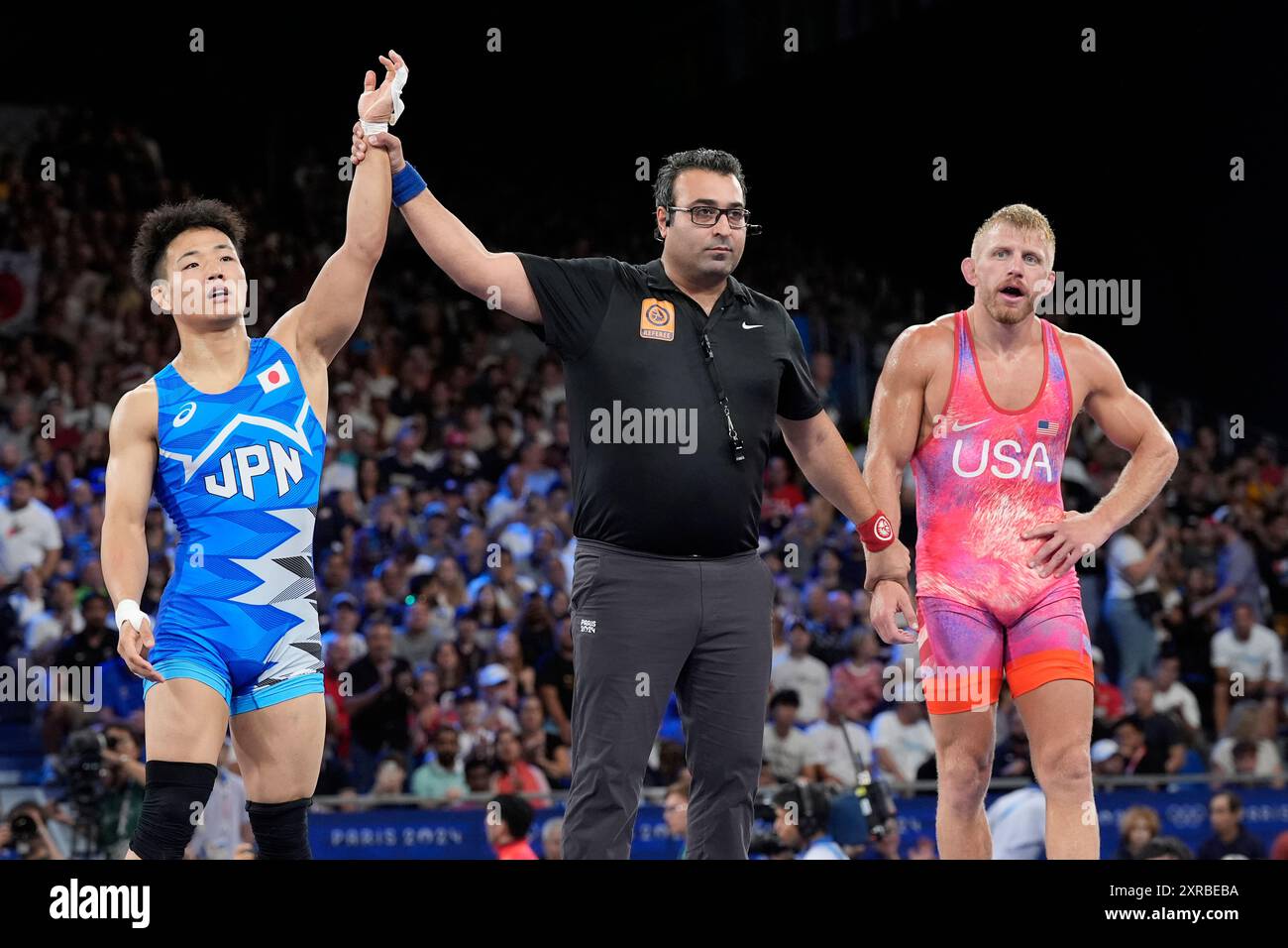 Japan's Daichi Takatani celebrates after defeating Kyle Douglas Dake ...