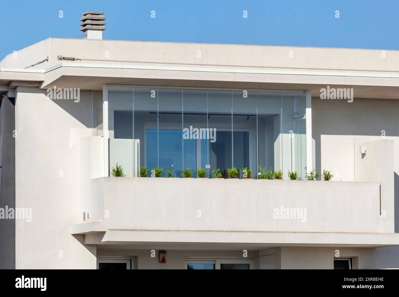 Veranda balcony with transparent glass without frames for a concealed ...