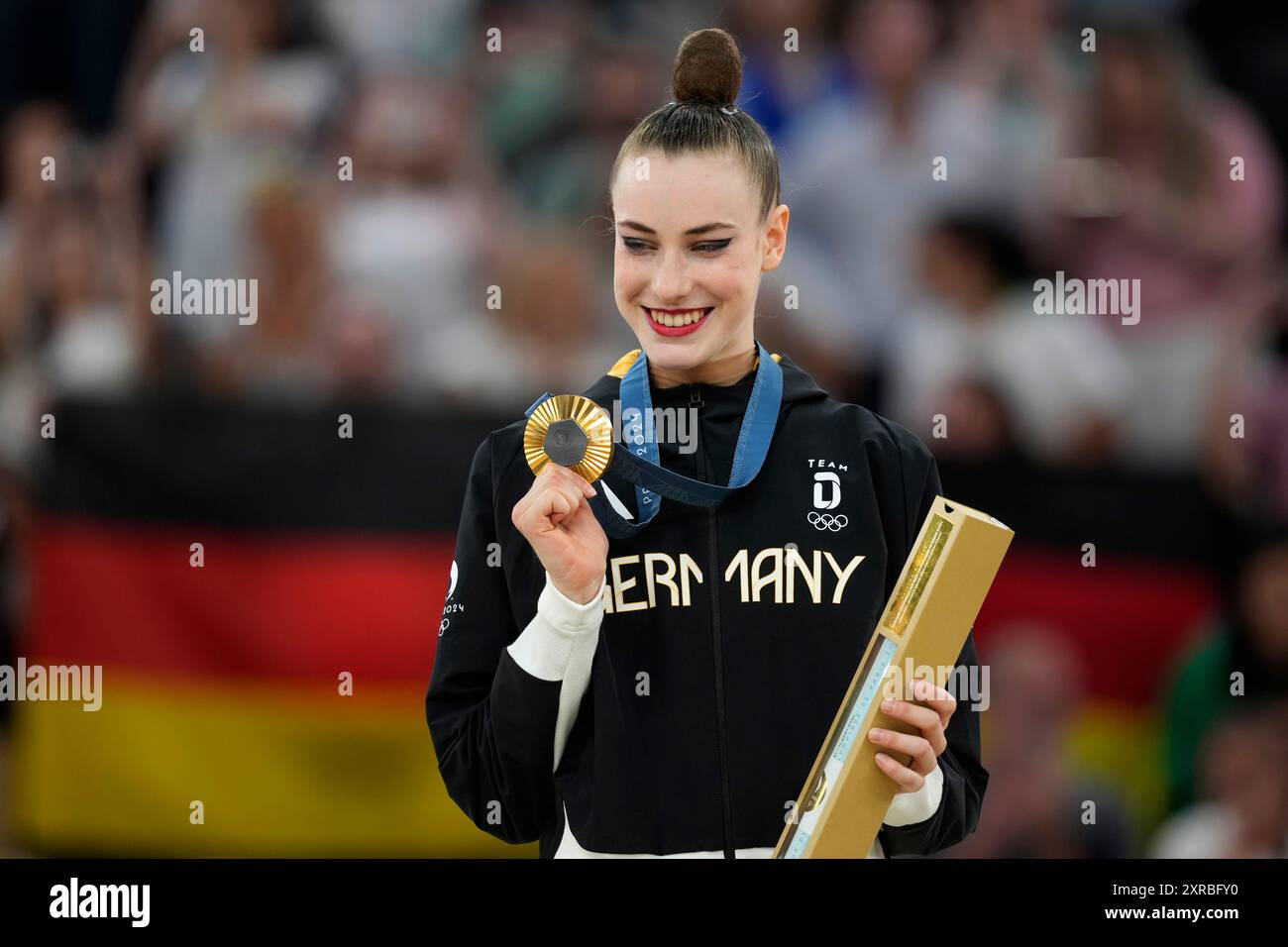 Gold medalist Daria Varfolomeev, of Germany, poses with her medal in ...