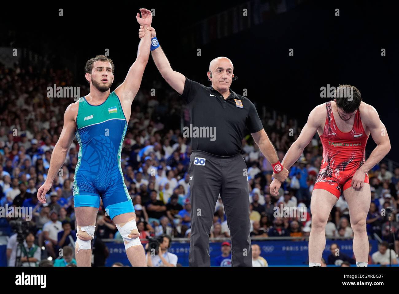 Uzbekistan's Razambek Salambekovich Jamalov celebrates after defeating ...