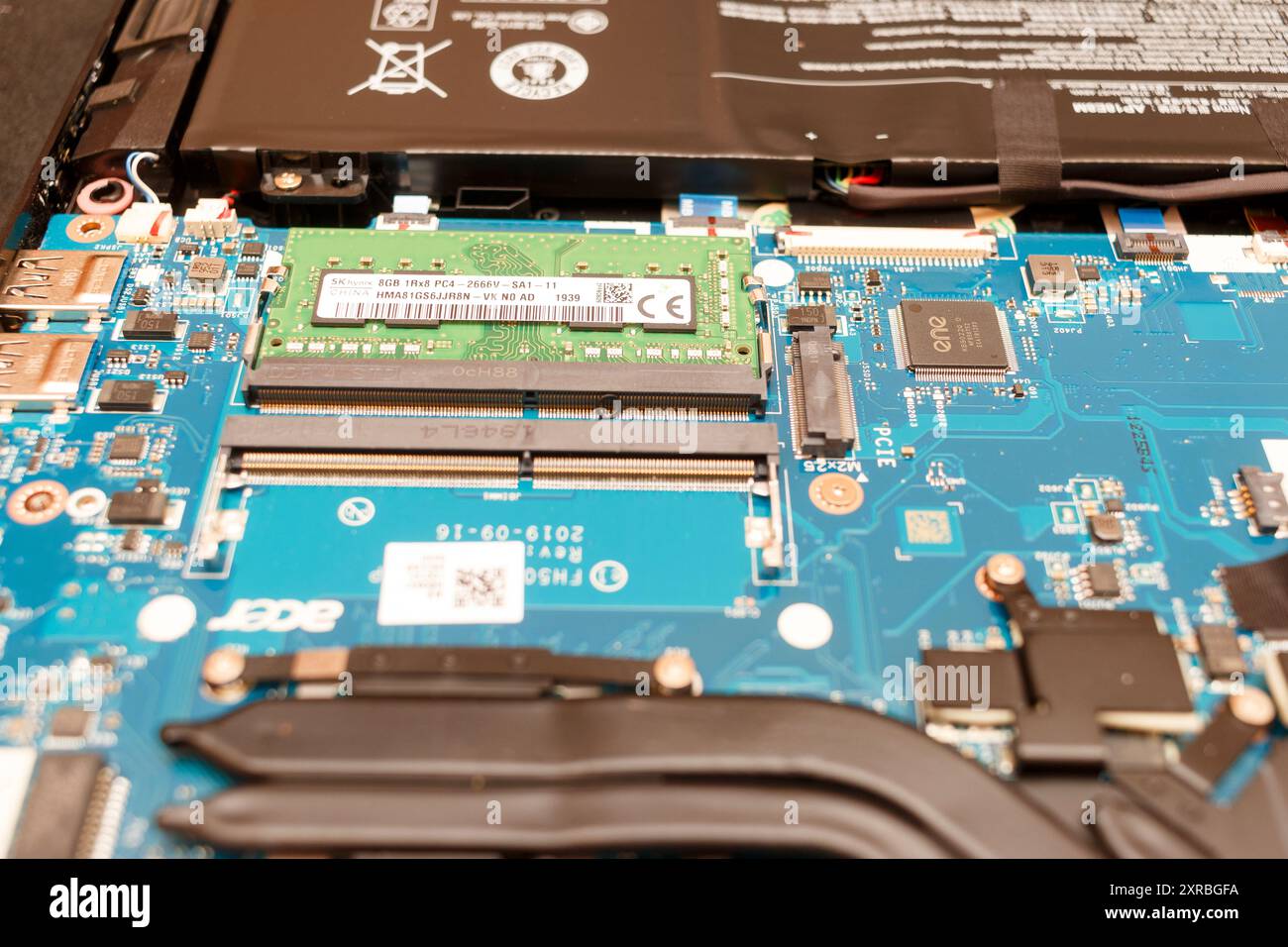 Iserlohn, NRW, Germany. 09th of 2024. RAM stick inserted into laptop ...