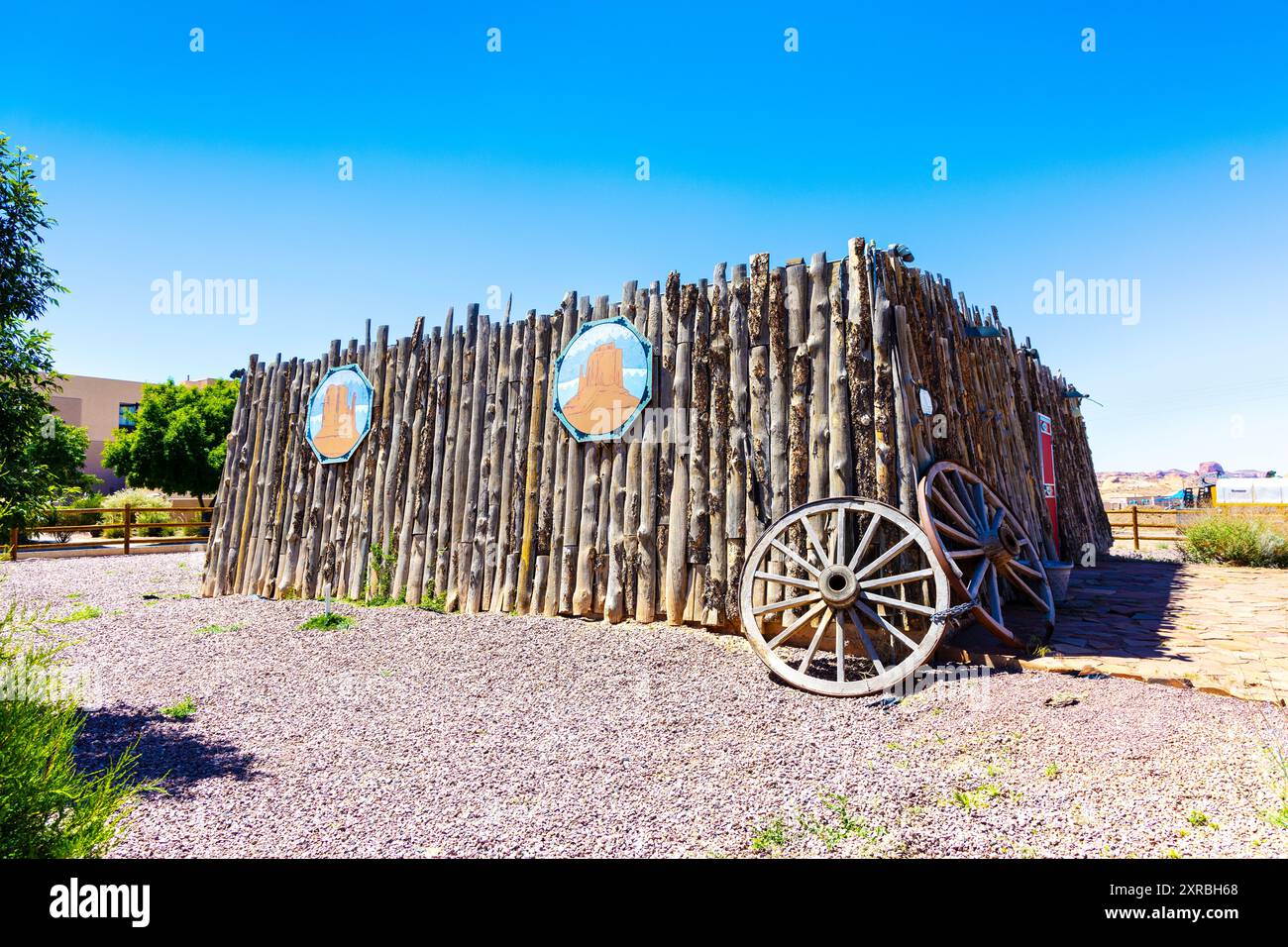 Exterior of a Navajo shade house made of logs, Navajo Shadehouse Museum ...
