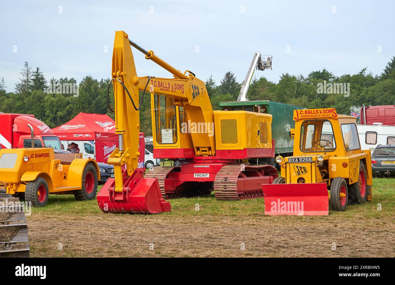 Line up of old diggers at a festival Stock Photo - Alamy