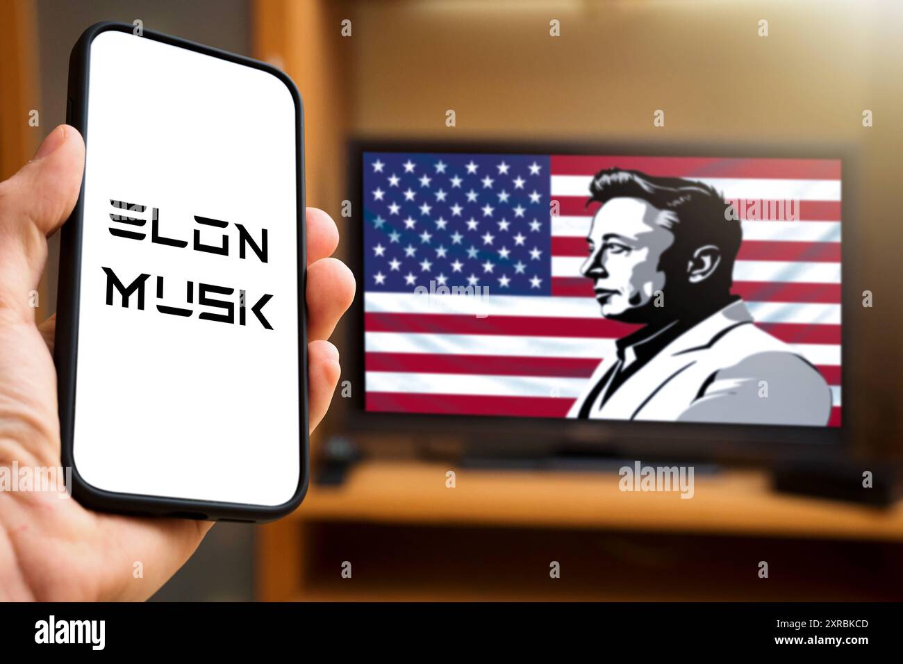 9 August 2024: Smartphone shows the name Elon Musk, while a stylized ...
