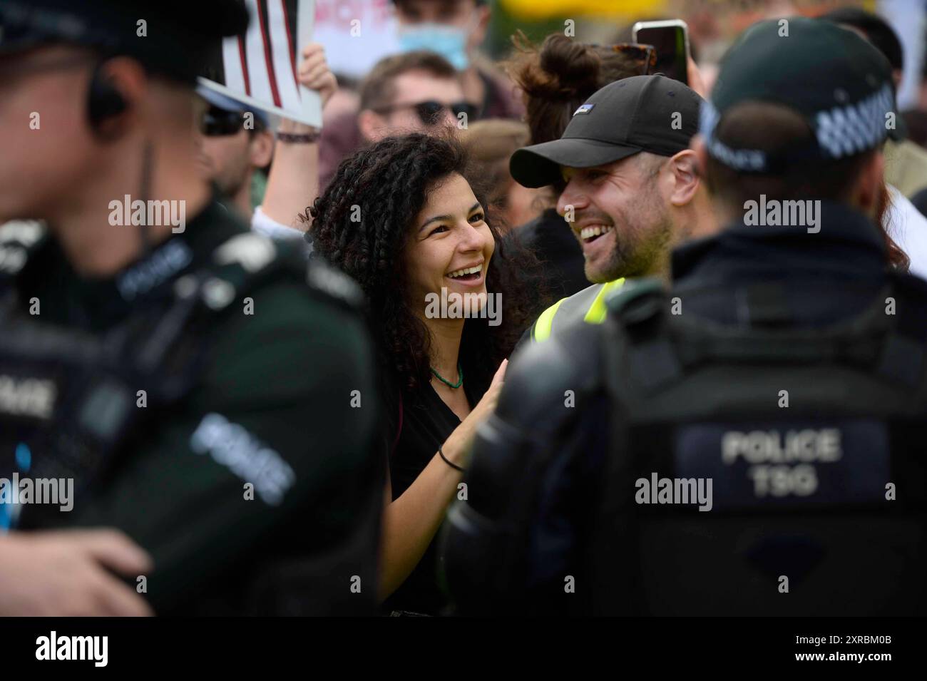 An anti-racism 'Unity Over Division' counter-protest in Belfast city ...