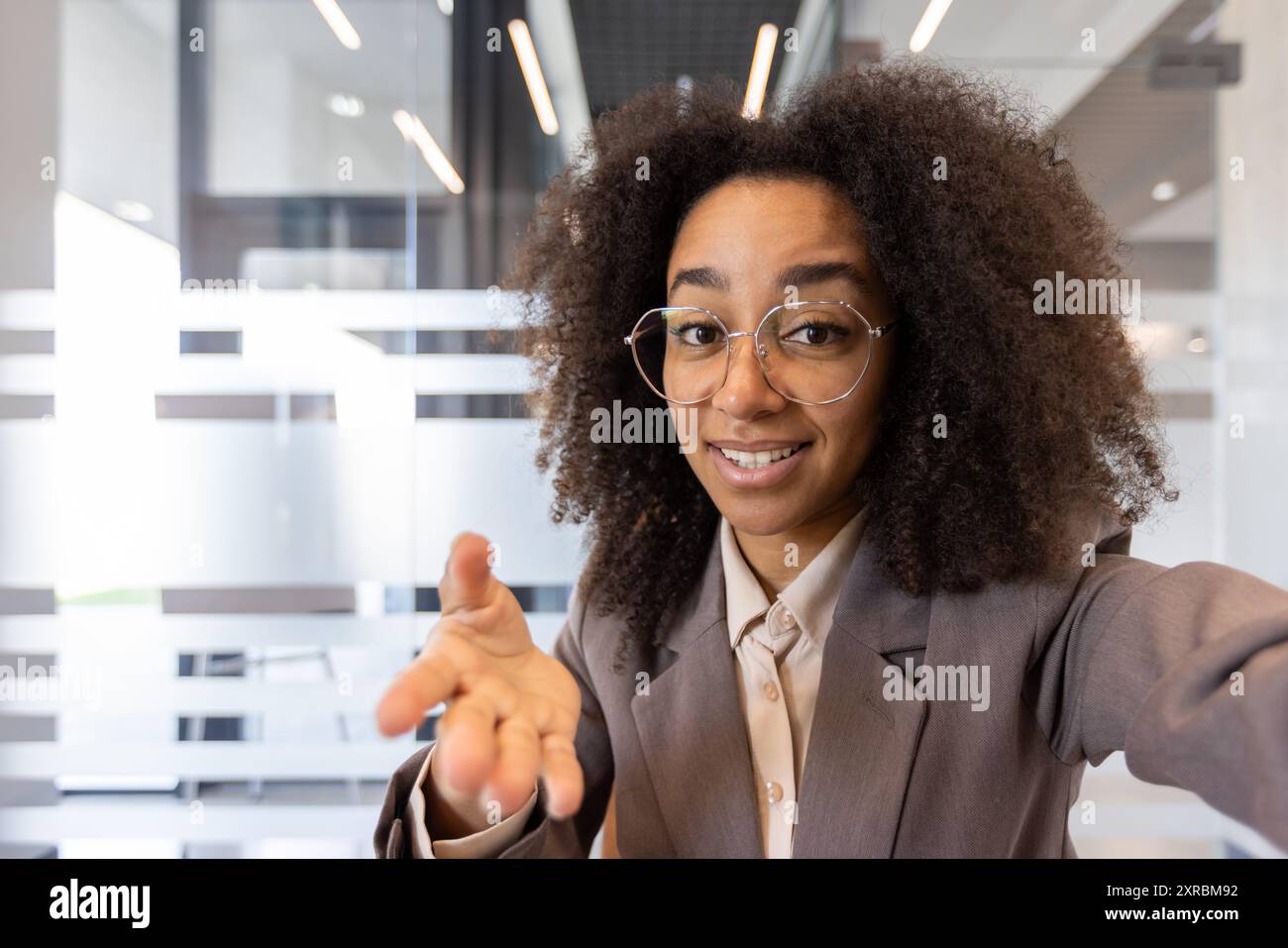 Young African American businesswoman having video call at workplace ...