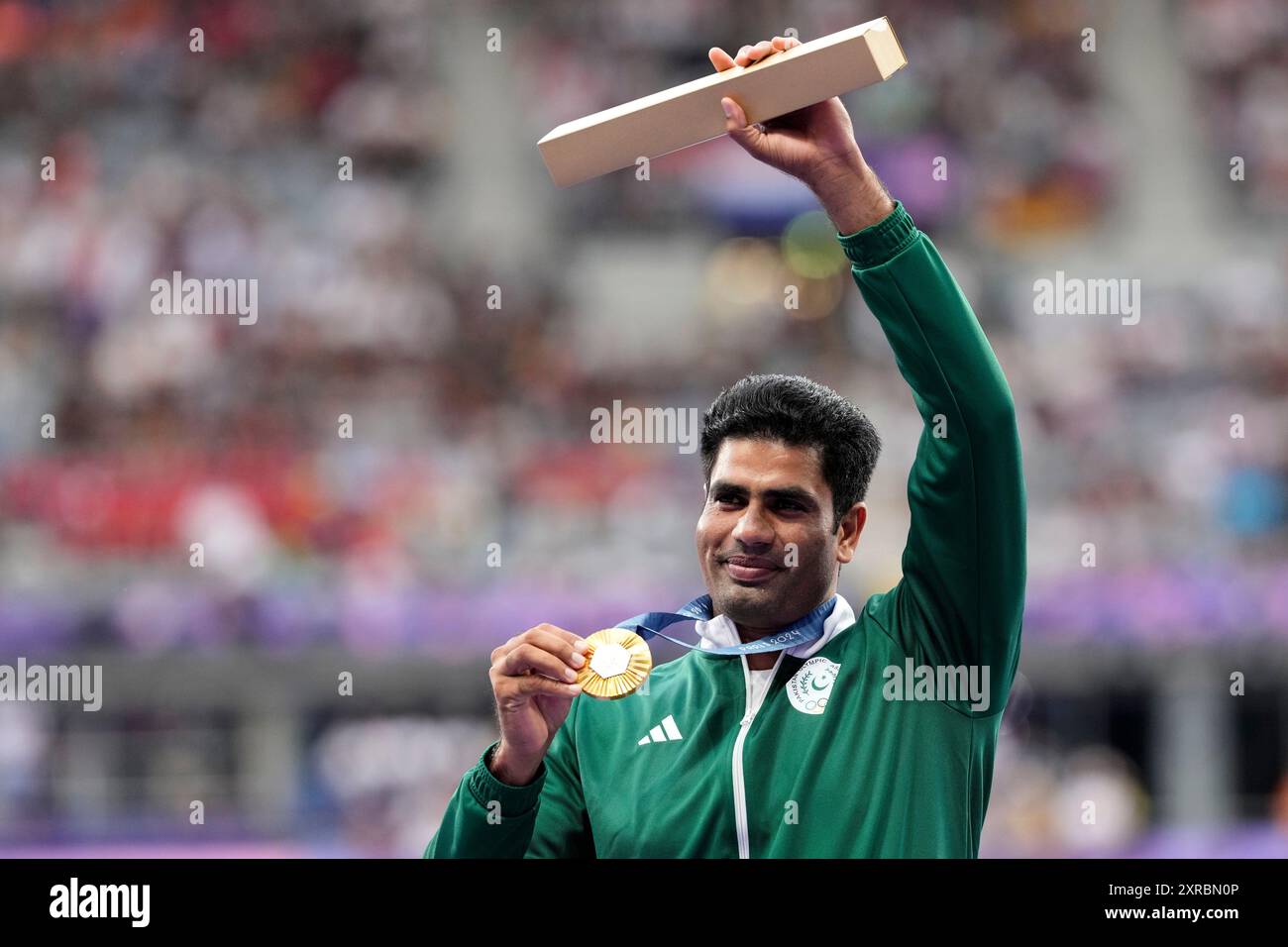 Men's javelin gold medalist, Arshad Nadeem, of Pakistan, waves on the ...