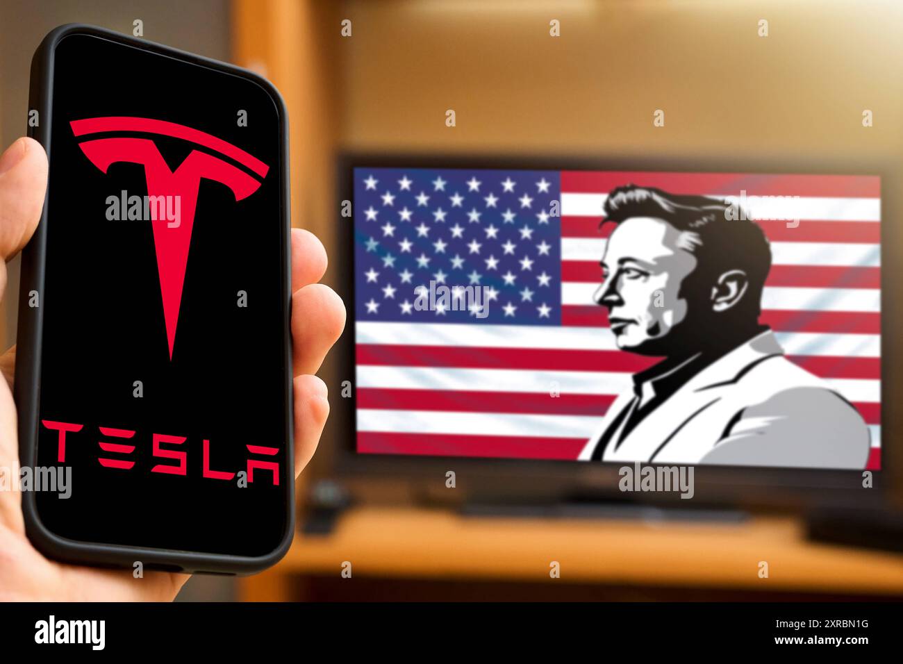 9 August 2024: A smartphone shows the Tesla logo, while a stylized ...