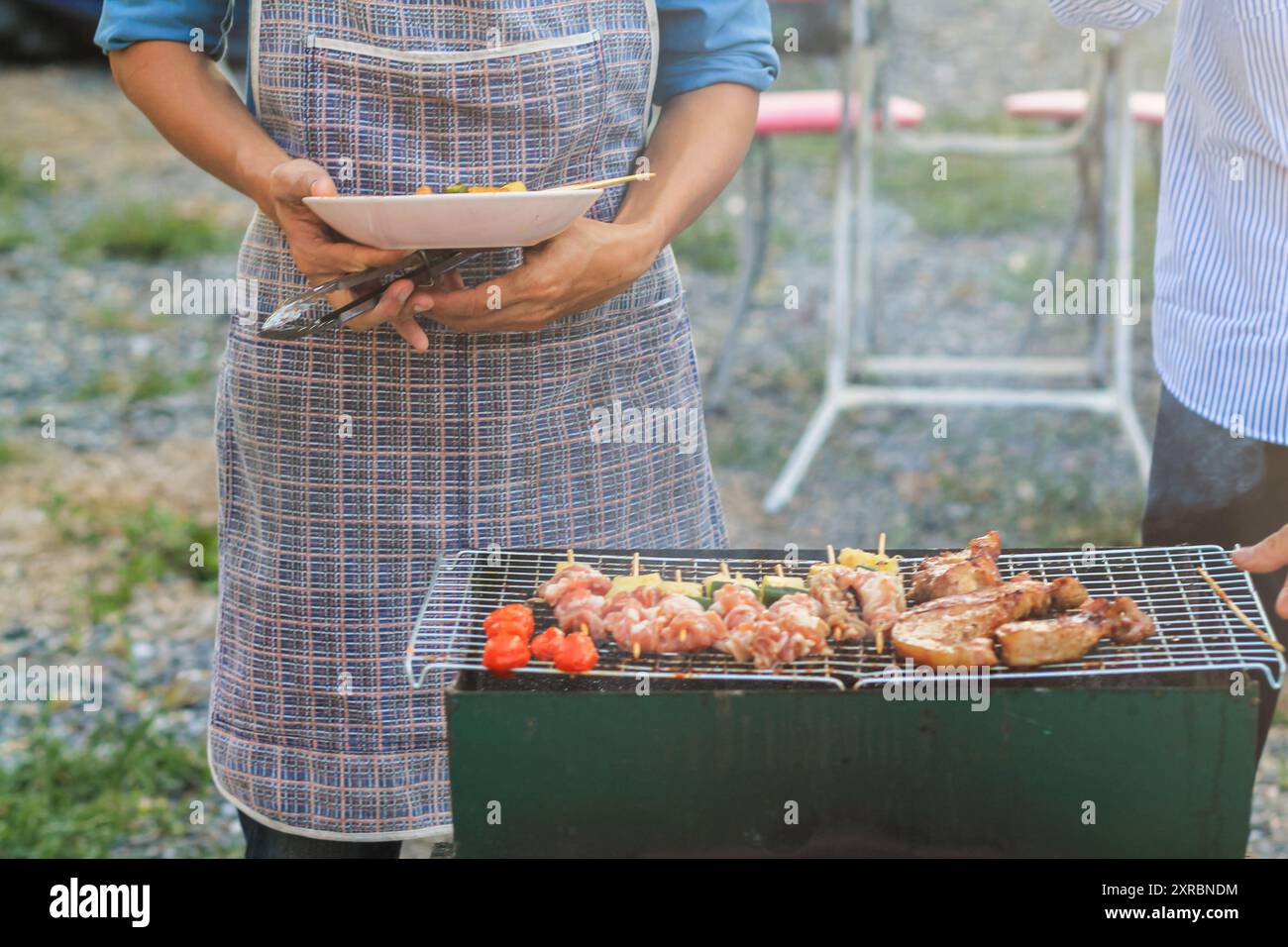 Blurred images , A group of colleagues held a barbecue party. (BBQ ...