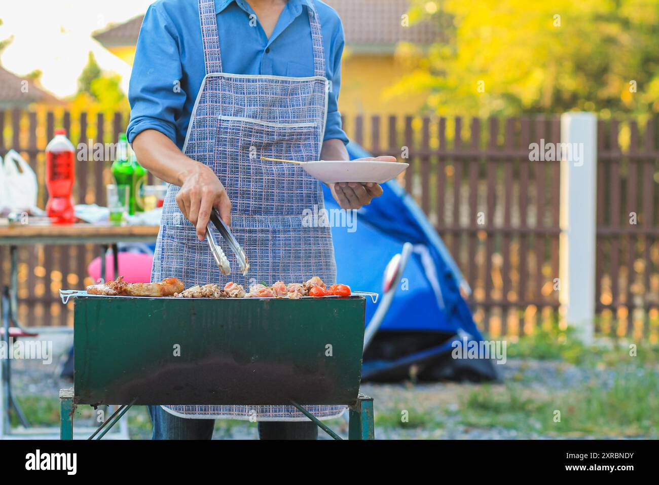 Blurred images , A group of colleagues held a barbecue party. (BBQ ...