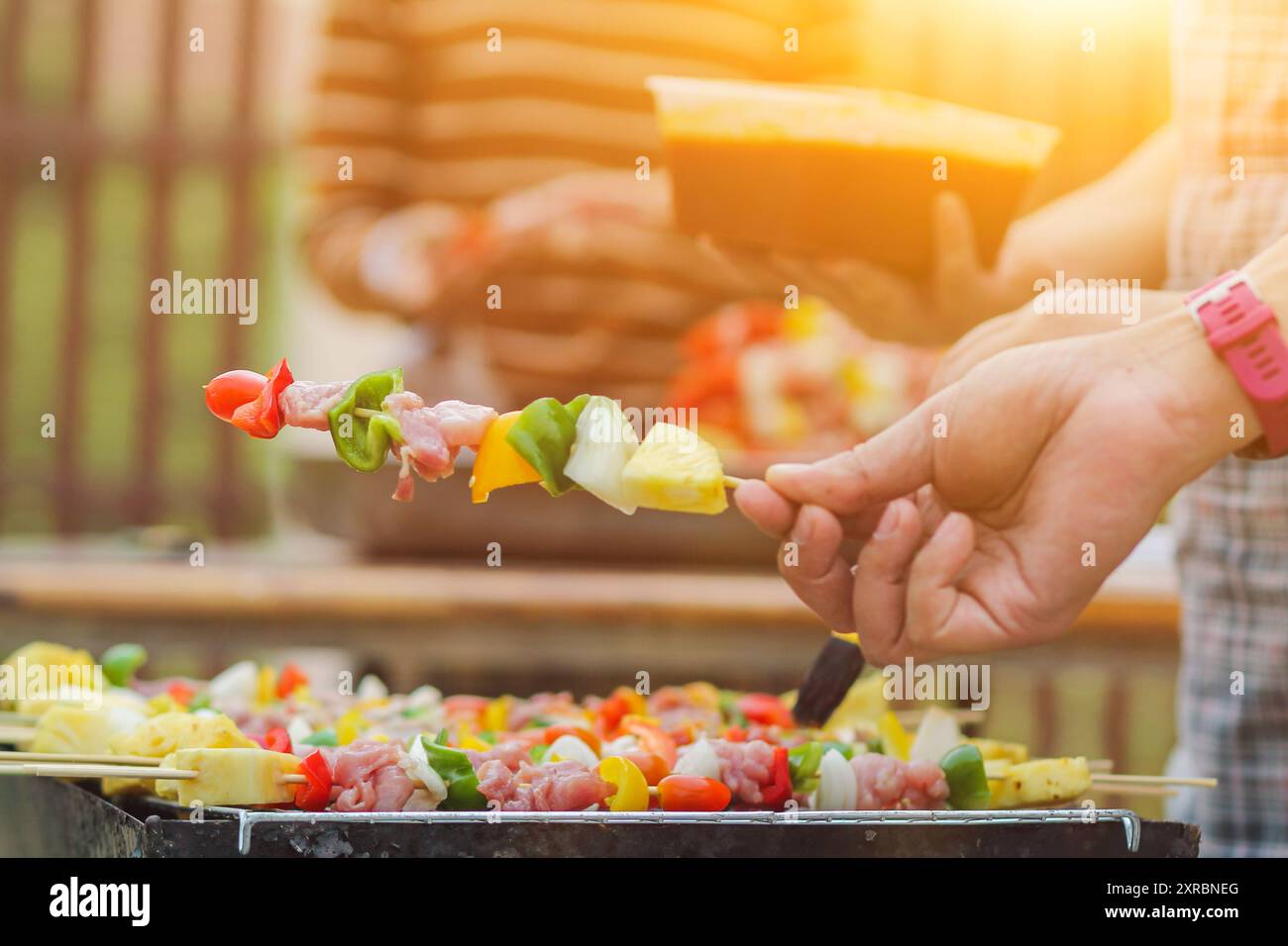 Blurred images , A group of colleagues held a barbecue party. (BBQ ...