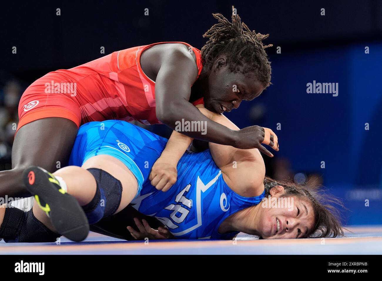Norway's Grace Jacob Bullen and Japan's Sakura Motoki, in blue, compete ...