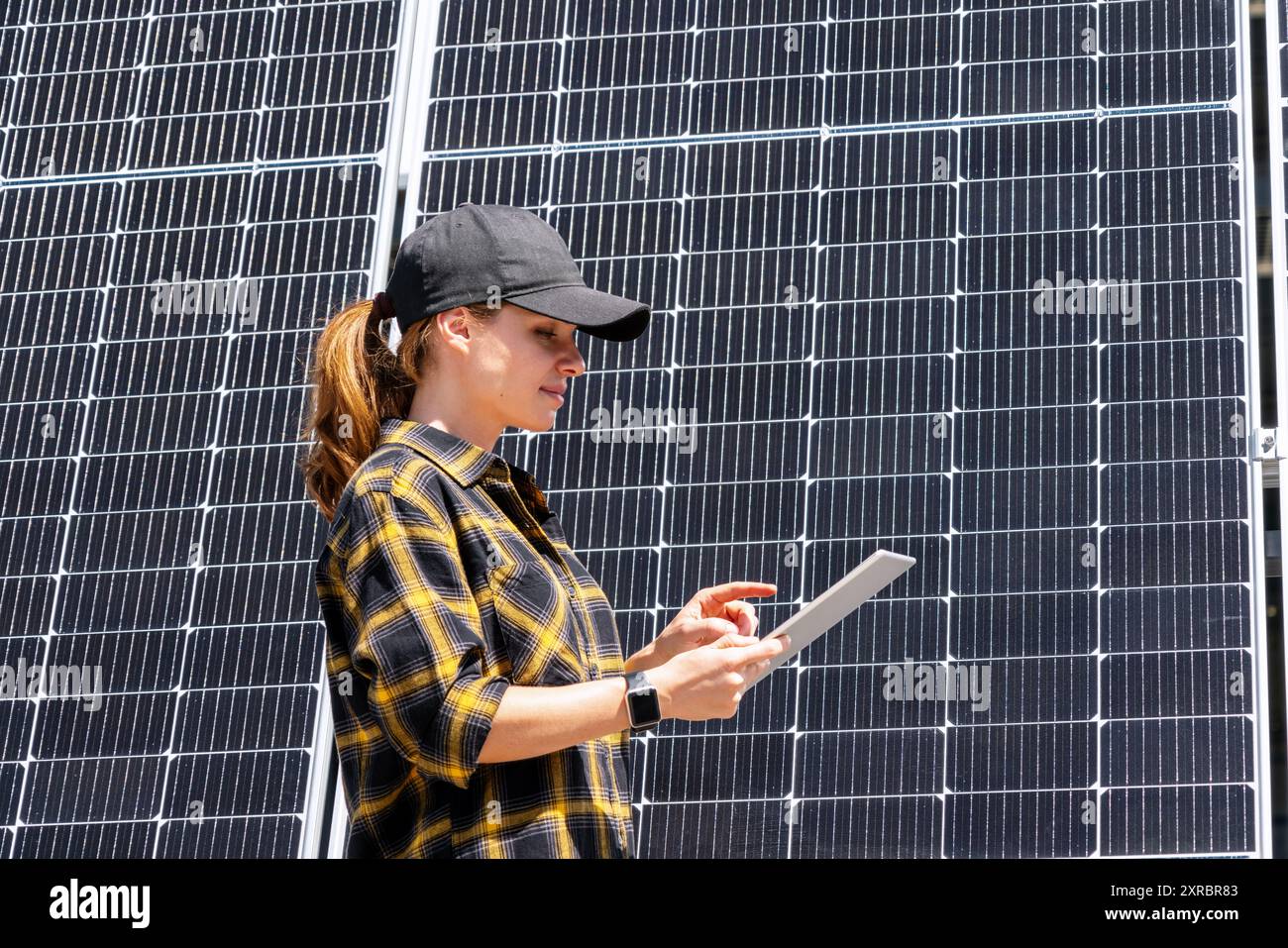 Attractive female solar power hi-res stock photography and images - Alamy