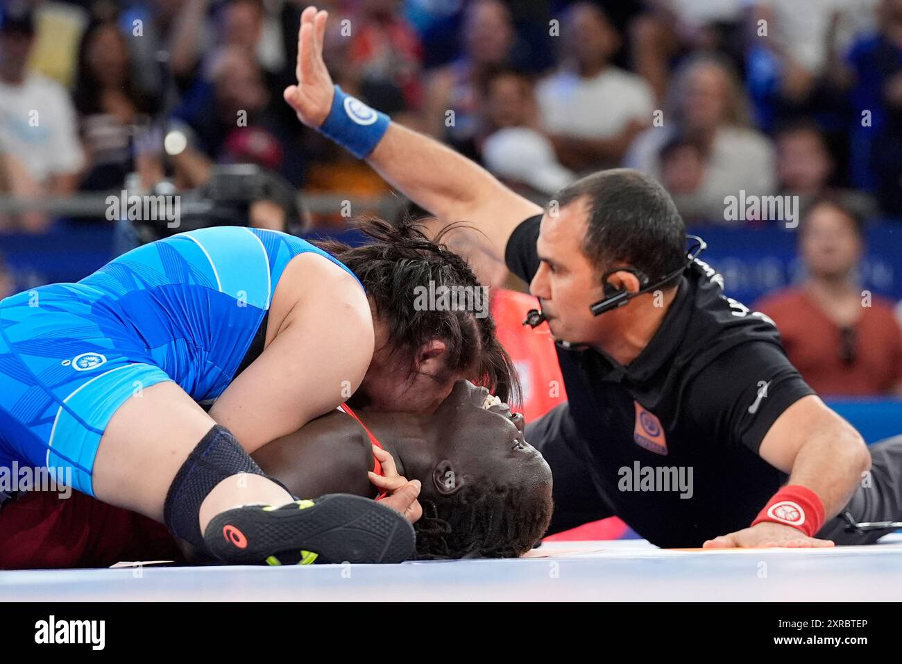Norway's Grace Jacob Bullen and Japan's Sakura Motoki, in blue, compete ...