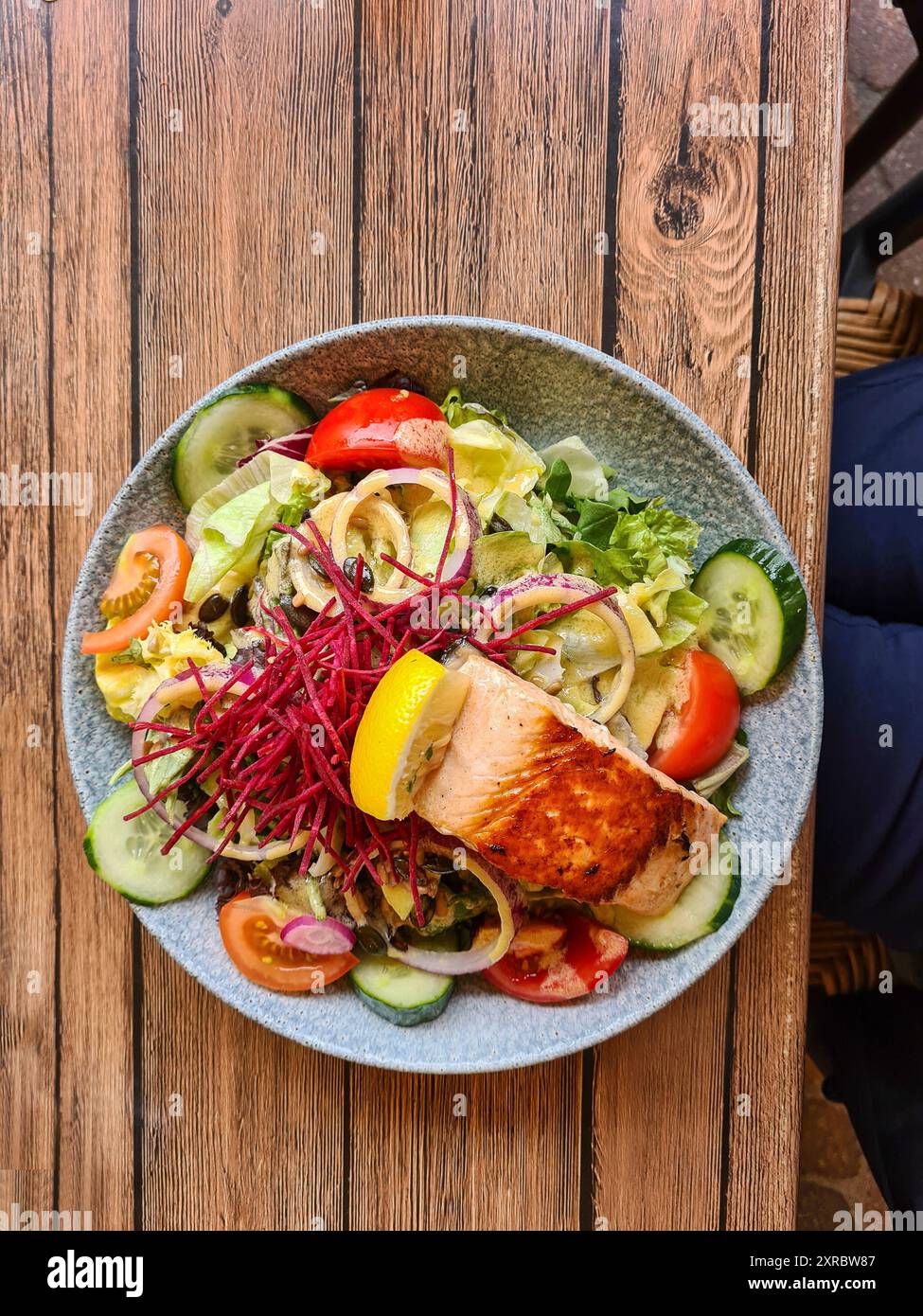 Baked salmon served salad hi-res stock photography and images - Alamy
