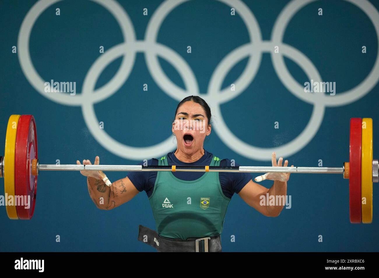 Amanda da Costa Schott competes during the women's 71kg weightlifting ...