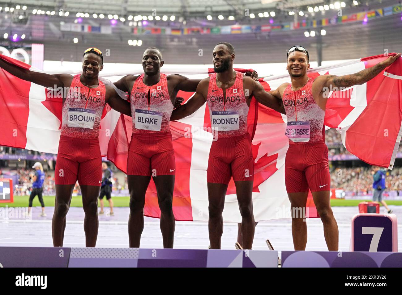Team Canada pose after winning the gold medal in the men's 4 x 100 ...