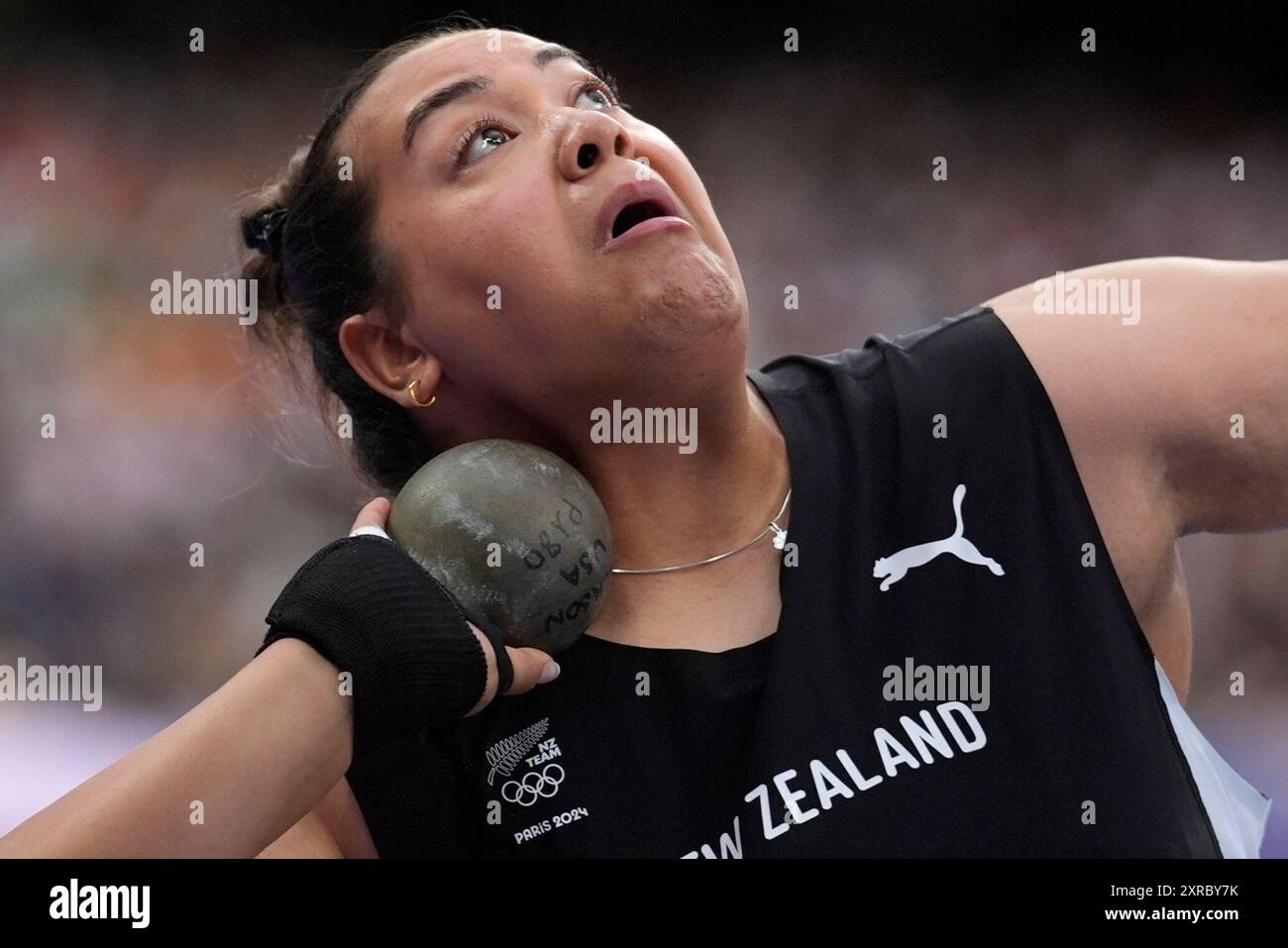Maddison-Lee Wesche, of New Zealand, competes in the women's shot put ...