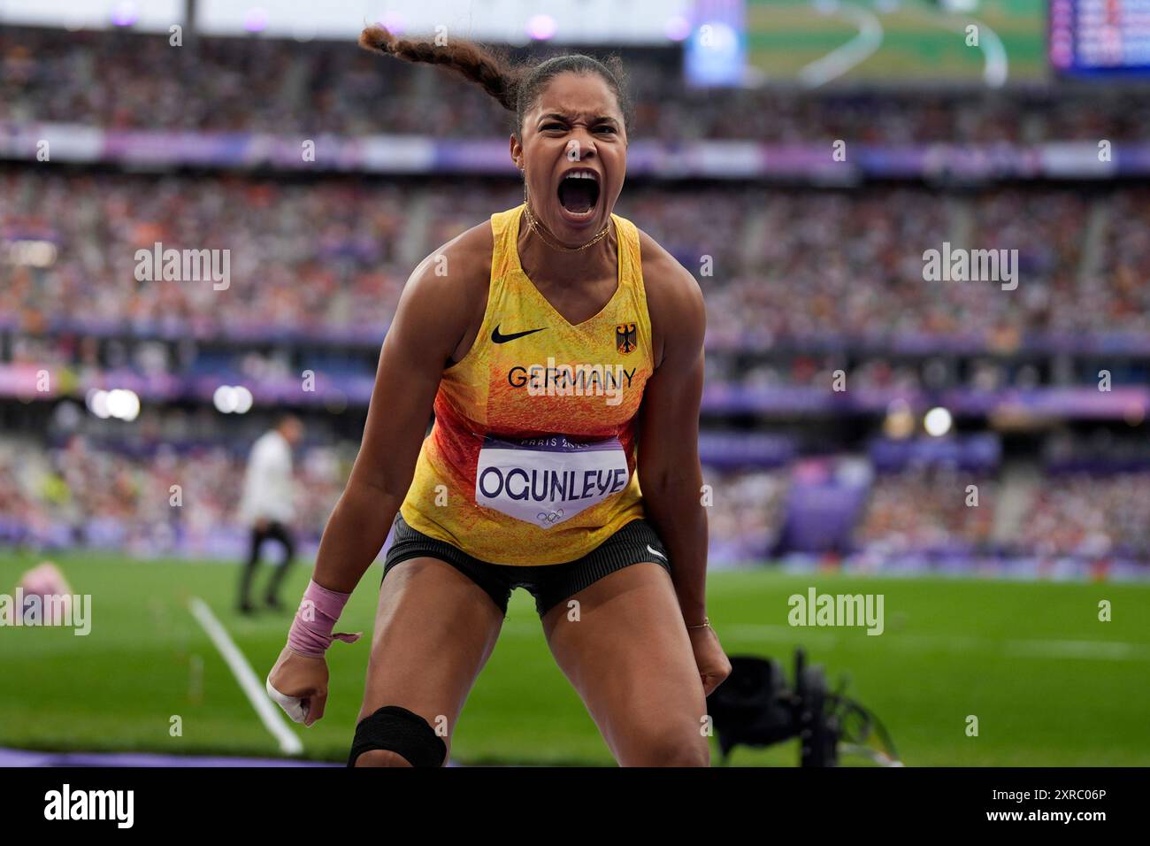 Yemisi Ogunleye, of Germany, reacts while competing in the women's shot ...