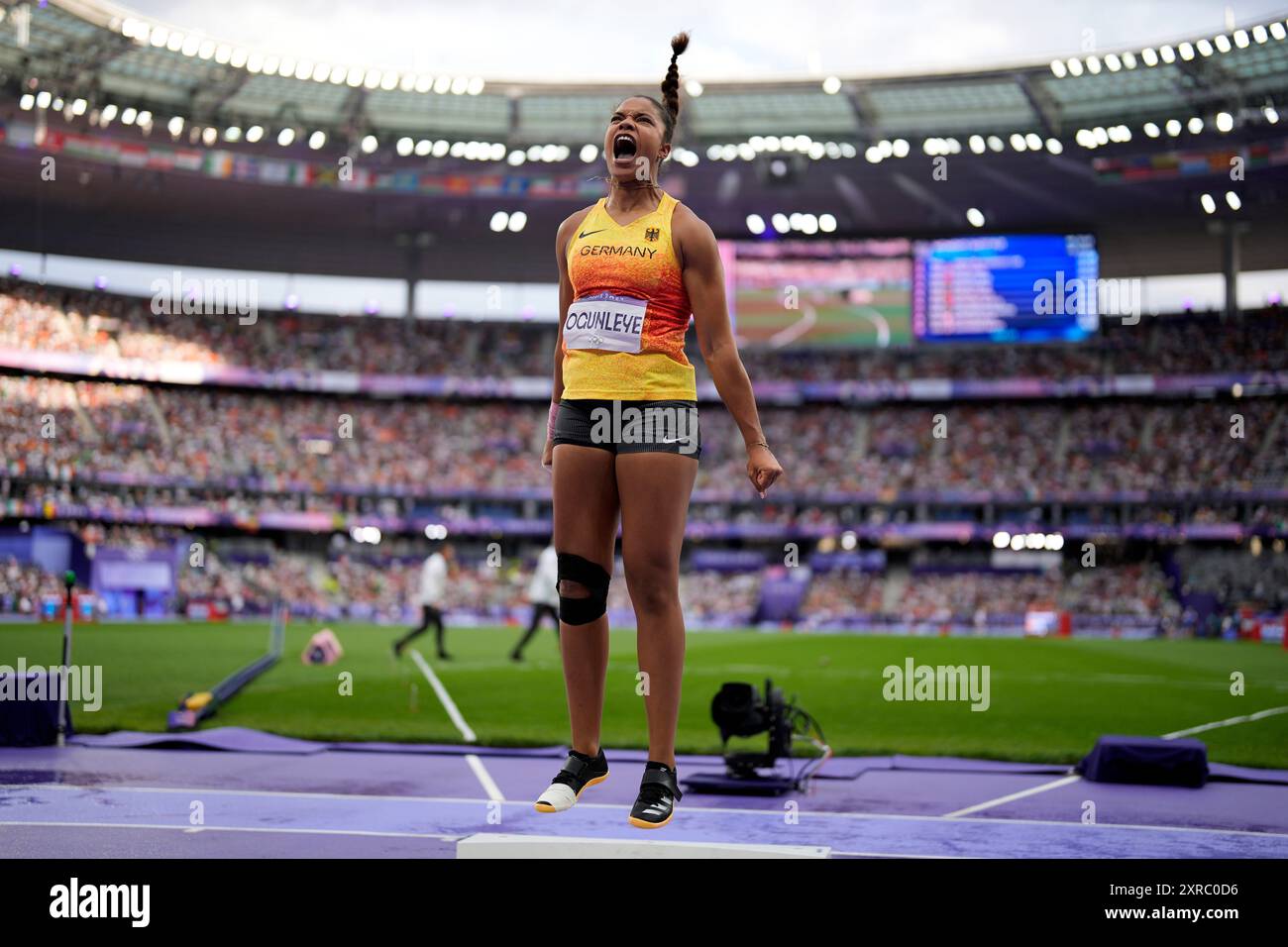 Yemisi Ogunleye, of Germany, reacts while competing in the women's shot ...