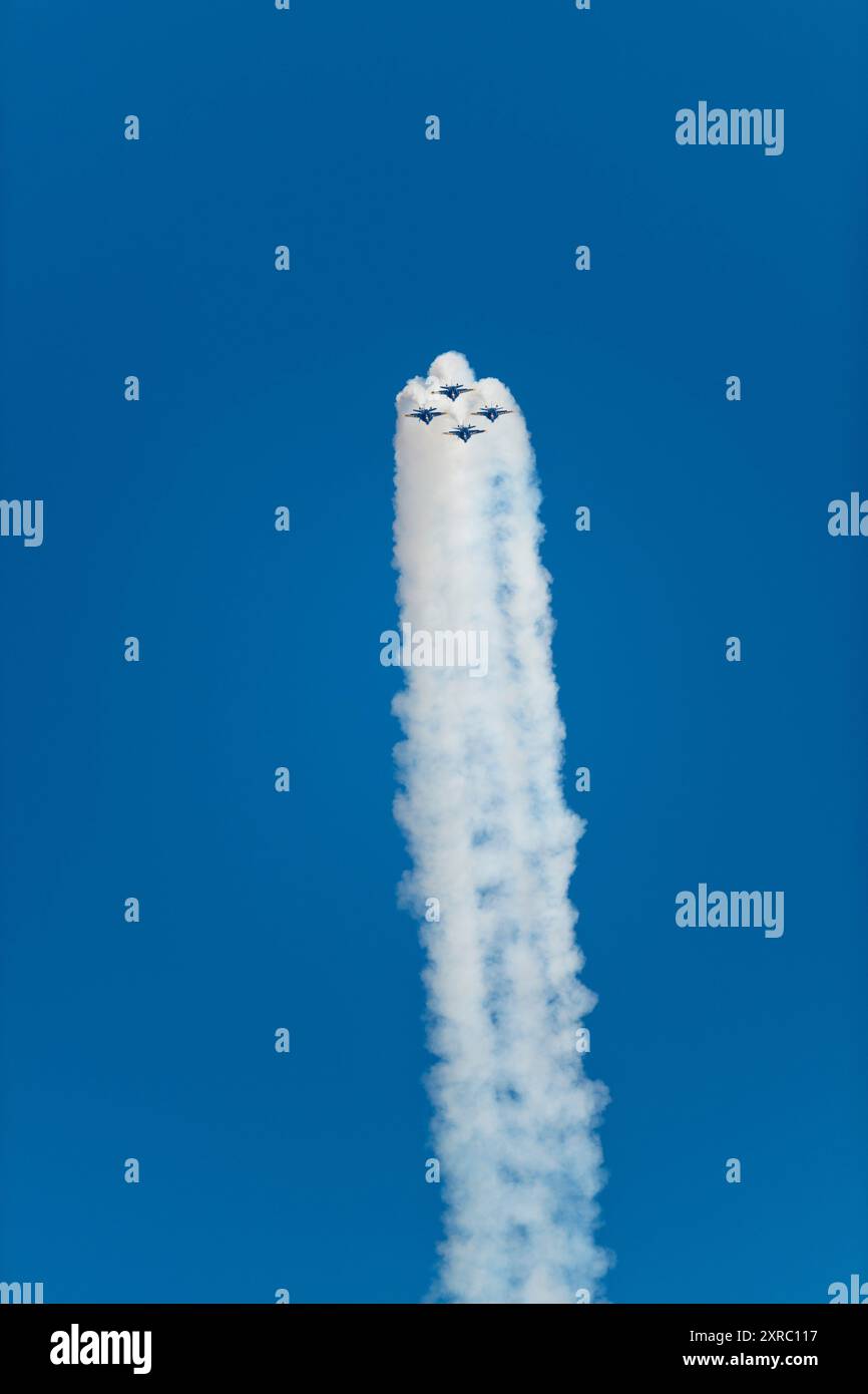 Four Blue Angels F/A-18 Hornets are flying The Diamond Roll (four ...