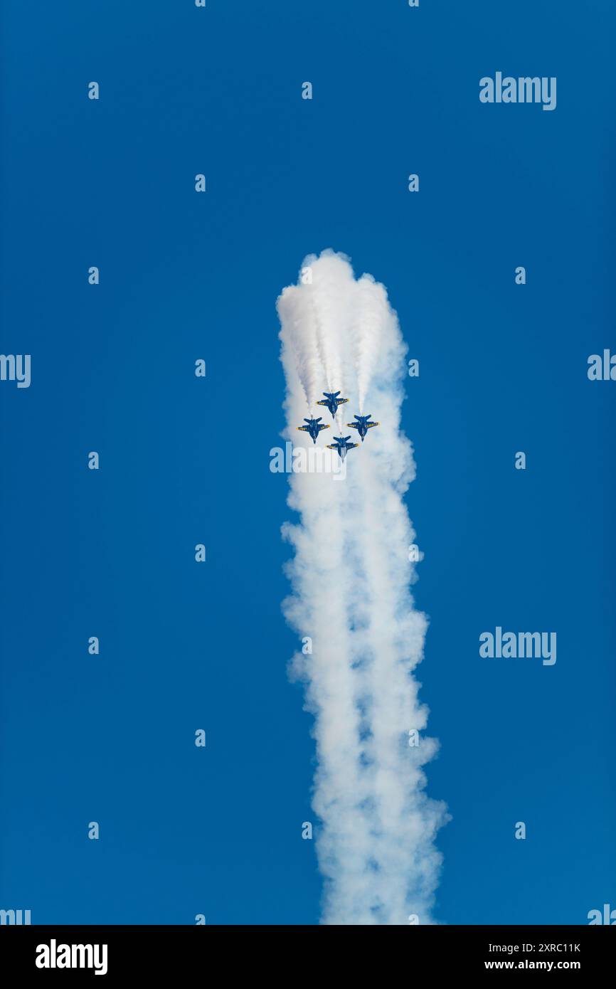 Four Blue Angels F/A-18 Hornets are flying The Diamond Roll (four ...