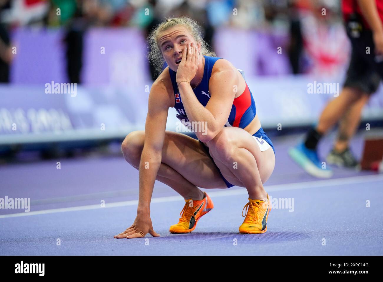 Henriette Jaeger, of Norway, reacts after the women's 400-meter final ...