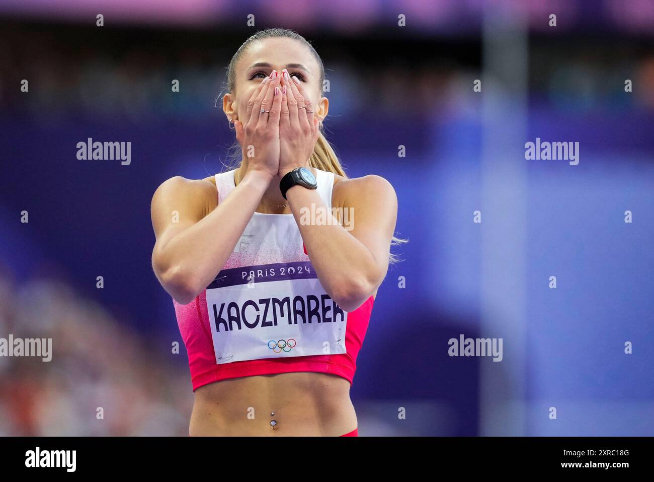 Marileidy Paulino, of the Dominican Republic, reacts after third place ...
