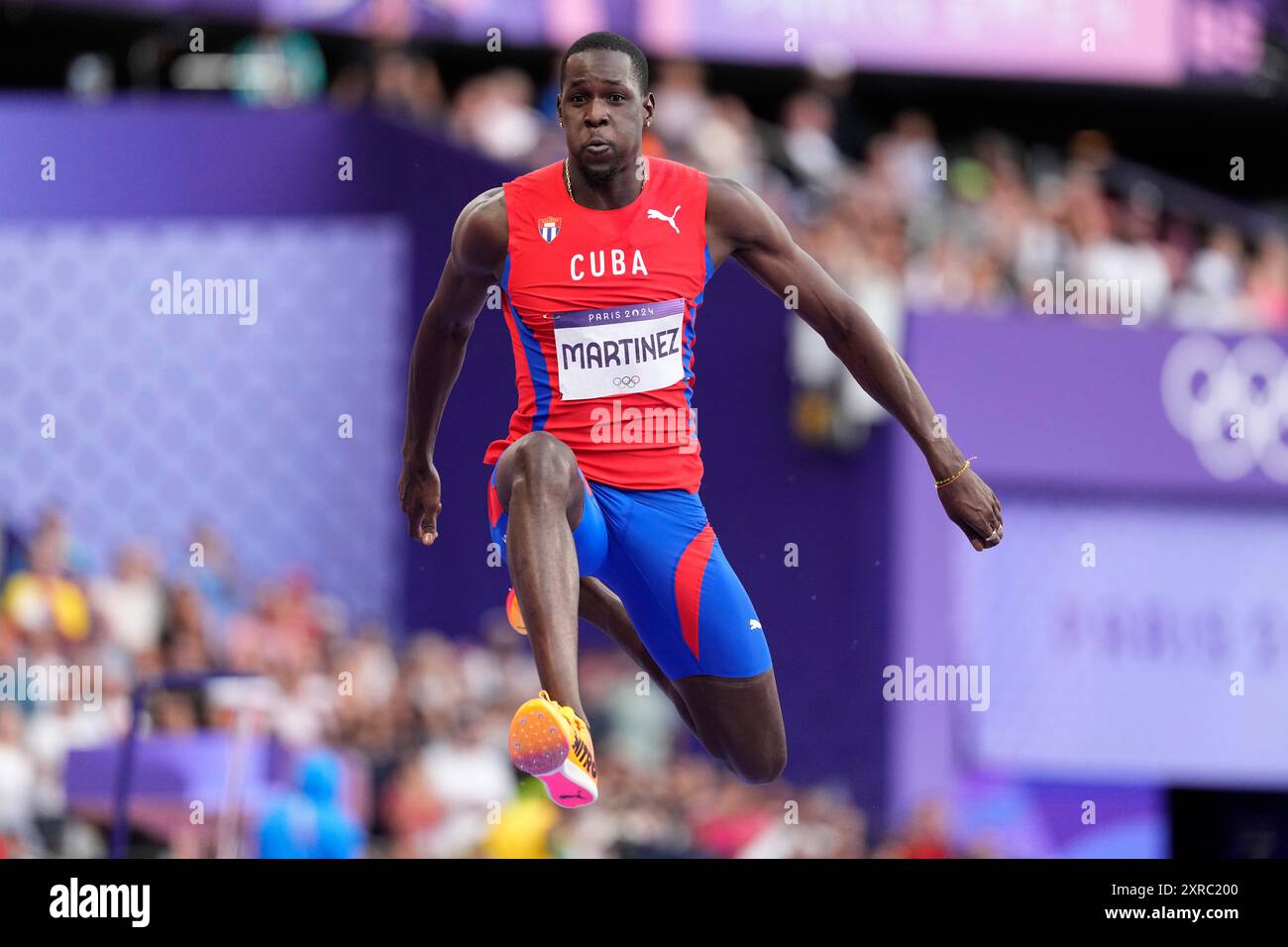 Lazaro Martinez, of Cuba, competes in the men's triple jump final at ...