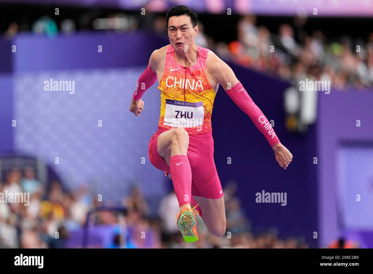 Zhu Yaming, of China, competes in the men's triple jump final at the ...