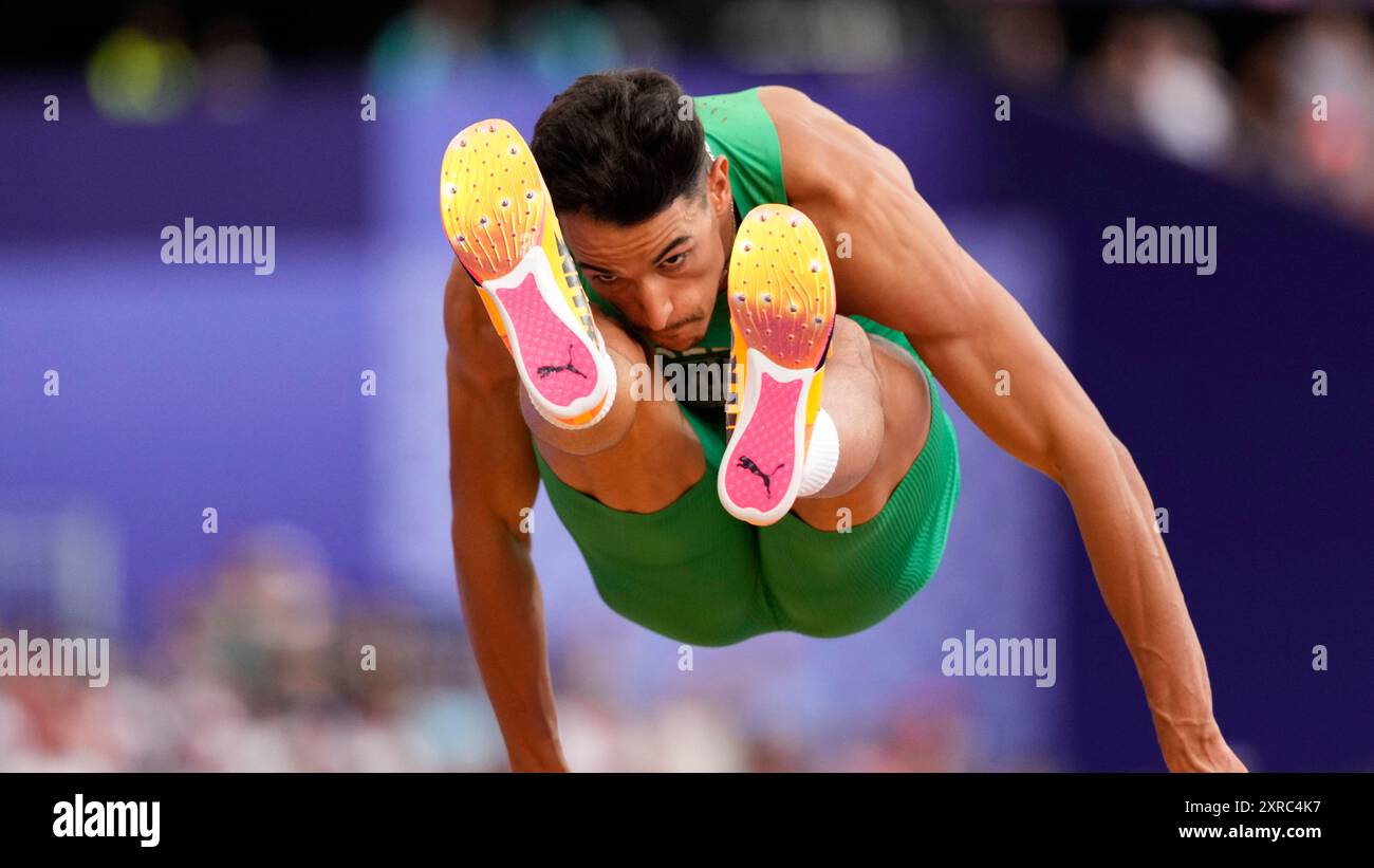 Yasser Mohammed Triki, of Algeria, competes in the men's triple jump ...