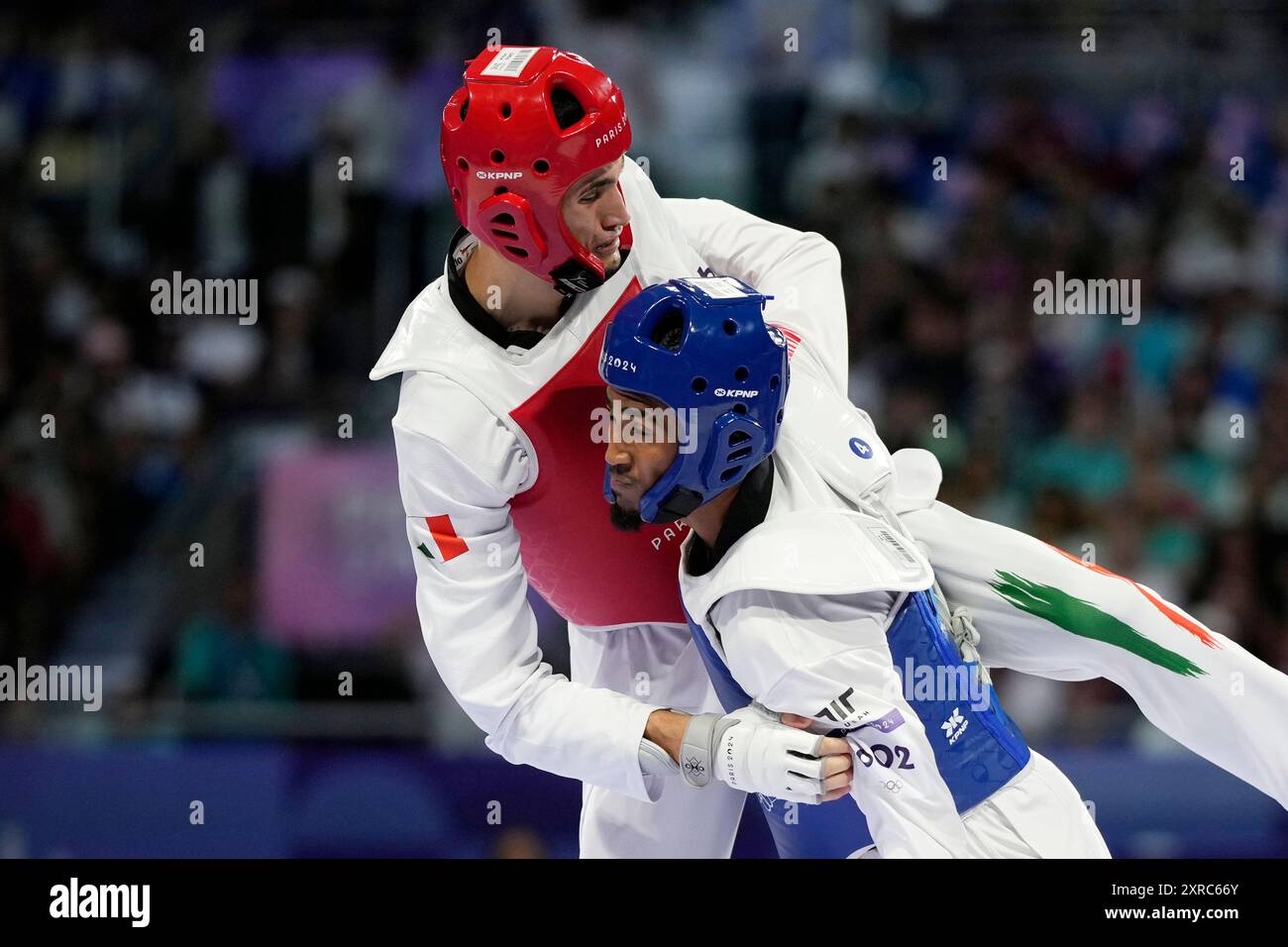 United States' Cj Nickolas competes with Italy's Simone Alessio in a ...
