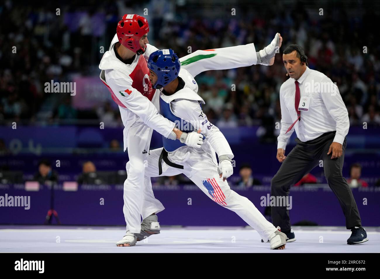 United States' Cj Nickolas competes with Italy's Simone Alessio in a ...