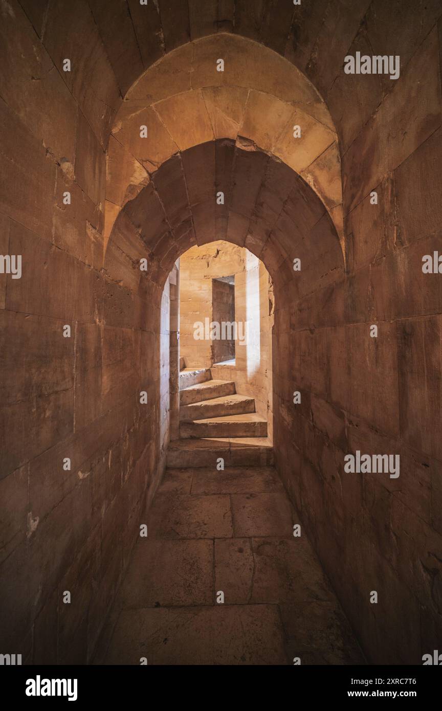 Interior view of a corridor with stairs in the Castel del Monte in ...